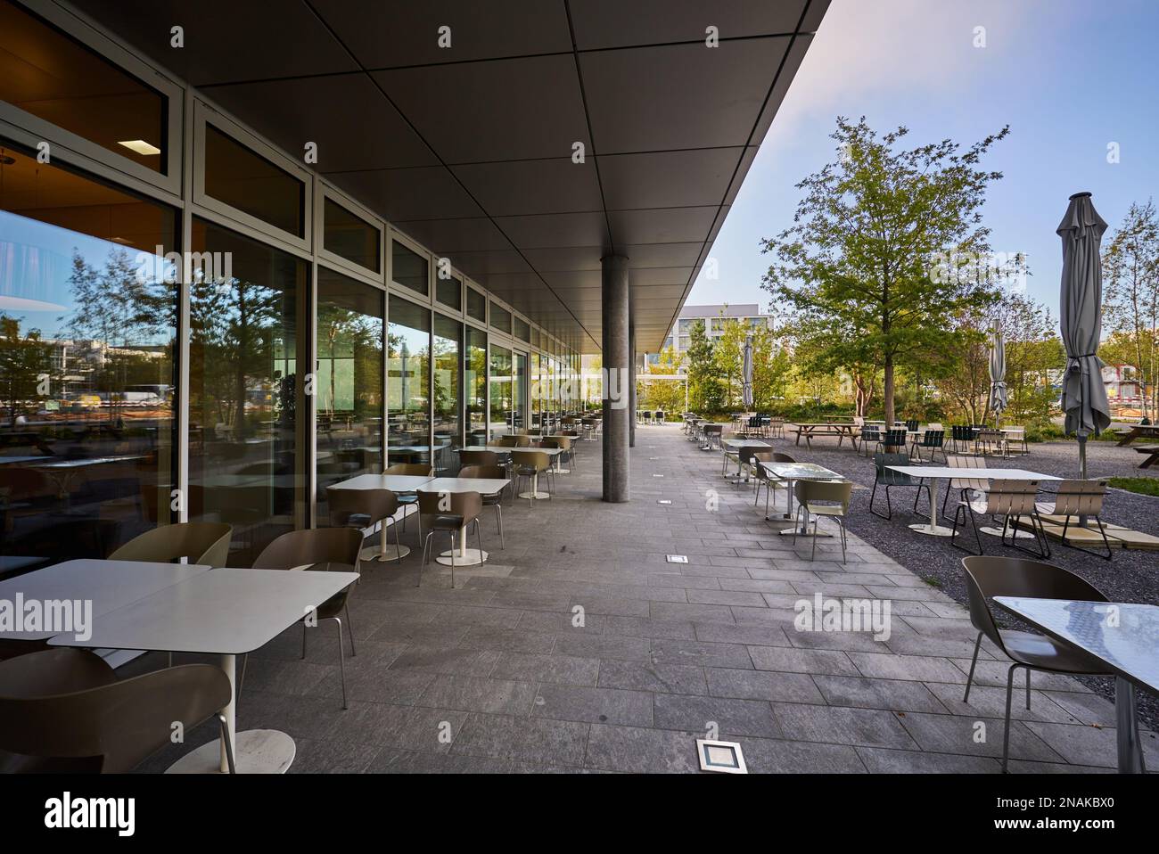 The cafeteria with tables and chairs outdoors Stock Photo - Alamy