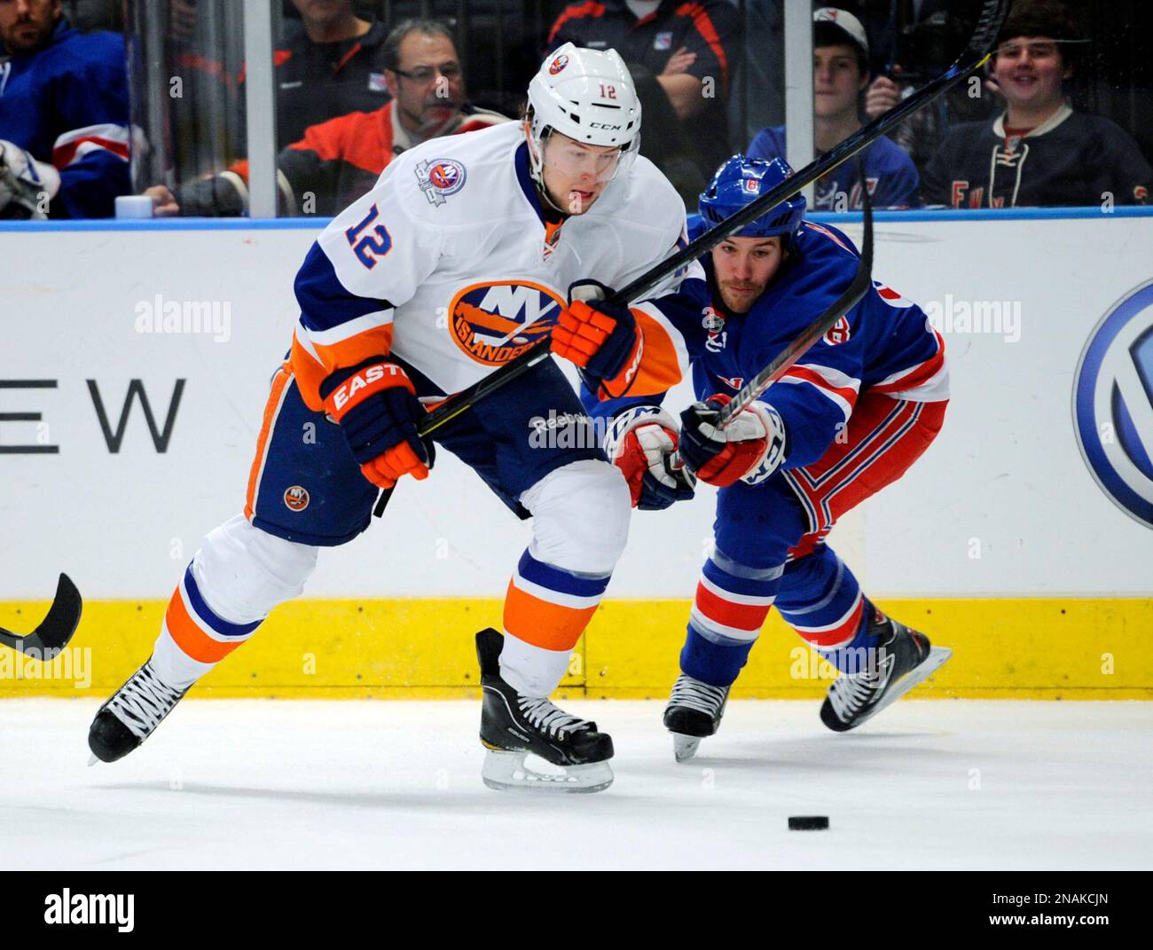 New York Islanders' Josh Bailey (12) and New York Rangers' Brandon ...