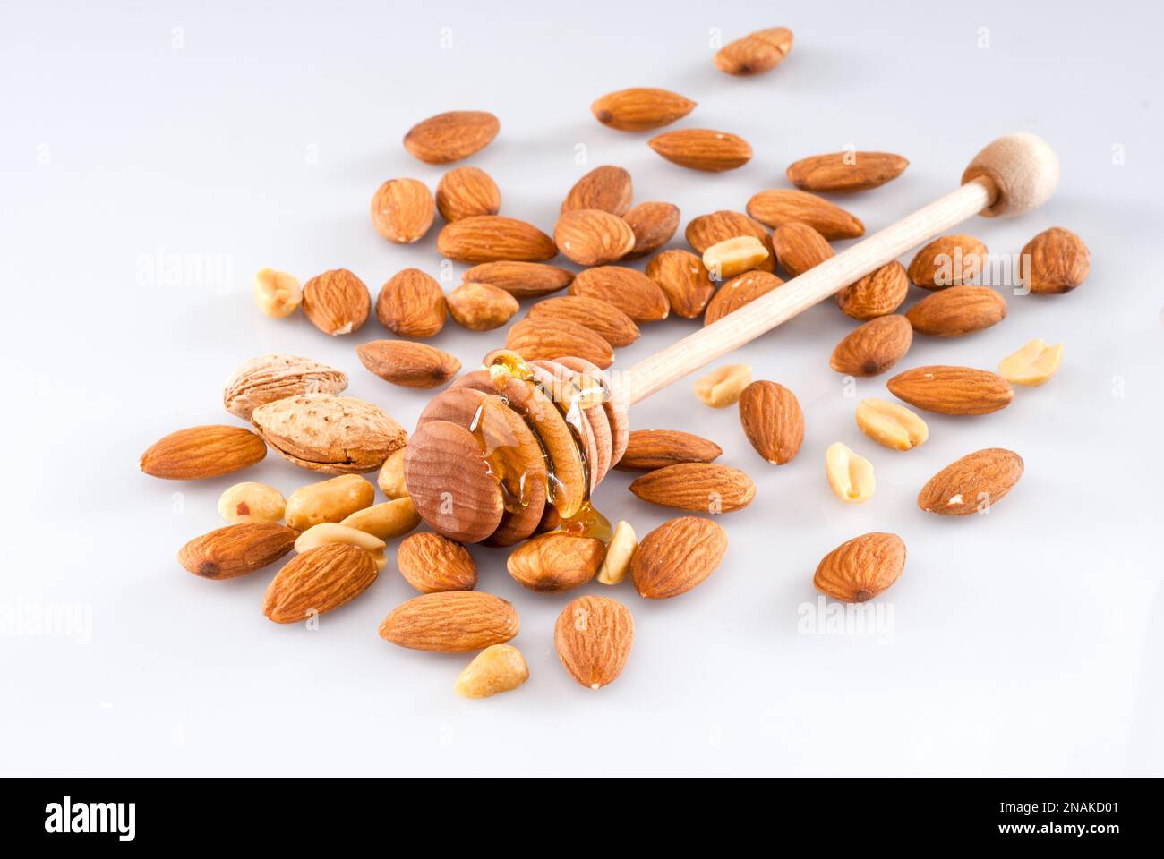 Almonds with honey hi-res stock photography and images - Alamy