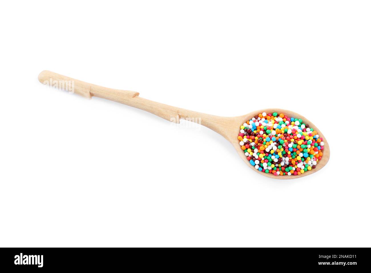 Colorful sprinkles in spoon on white background. Confectionery decor ...