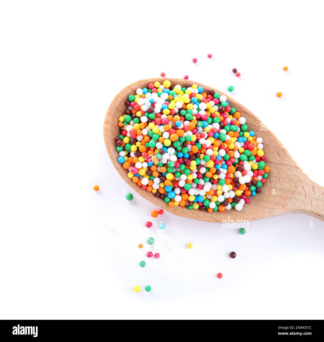 Colorful sprinkles in spoon on white background. Confectionery decor ...