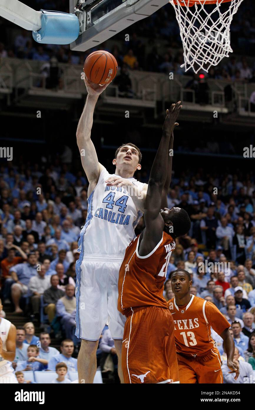 North Carolina's Tyler Zeller (44) shoots while Texas' Alexis Wangmene ...