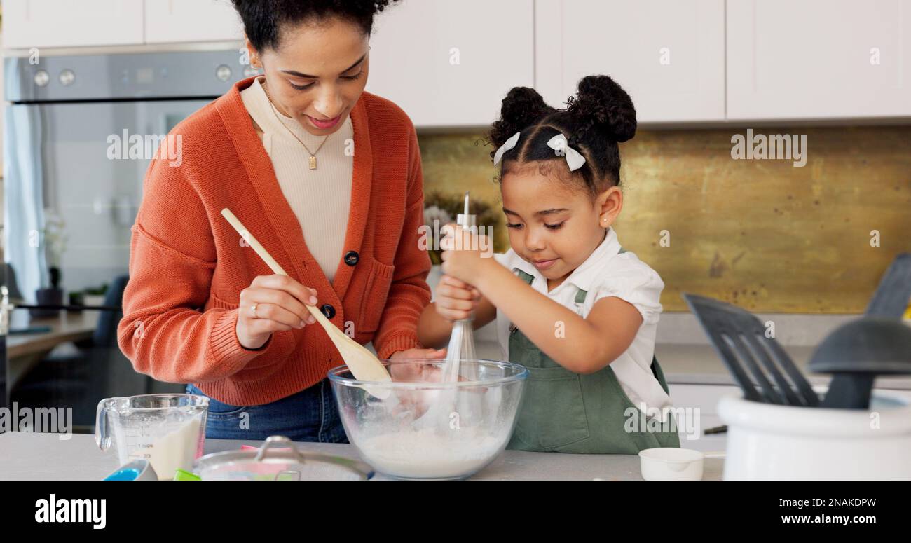 Family, cooking and child learning baking fun skills development ...