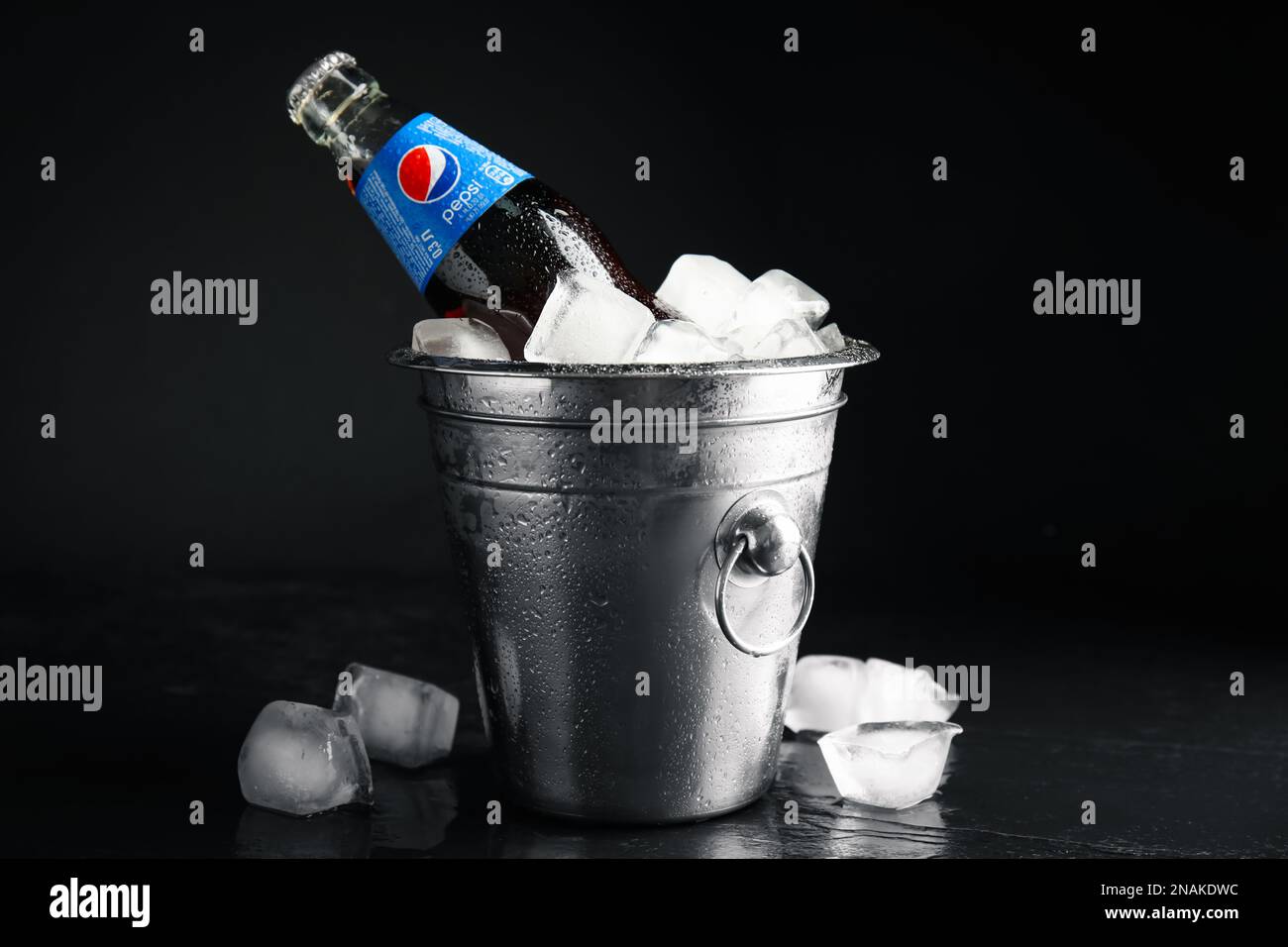 Dark blue bucket of ice background hi-res stock photography and images ...