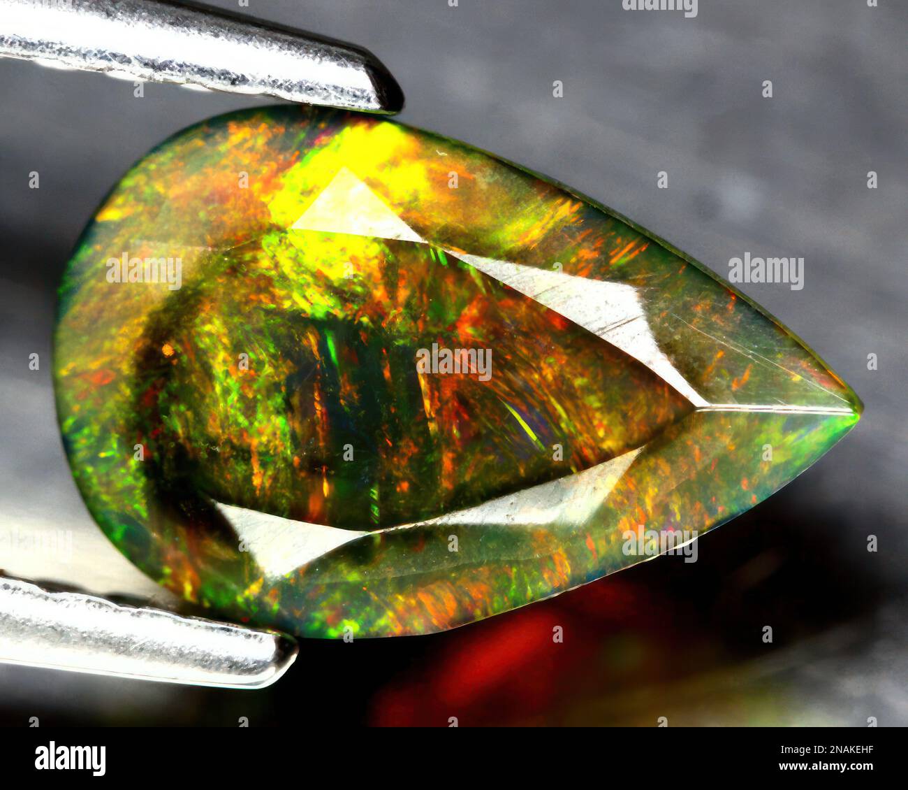 Natural precious stone noble opal on a black background Stock Photo - Alamy