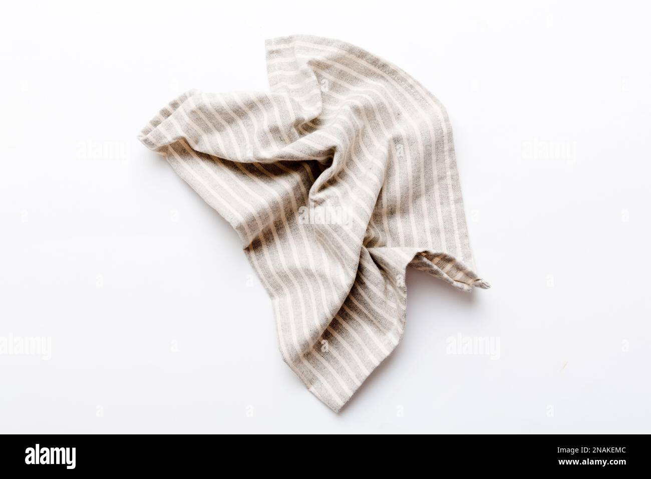 top view with gray kitchen napkin isolated on table background. Folded ...