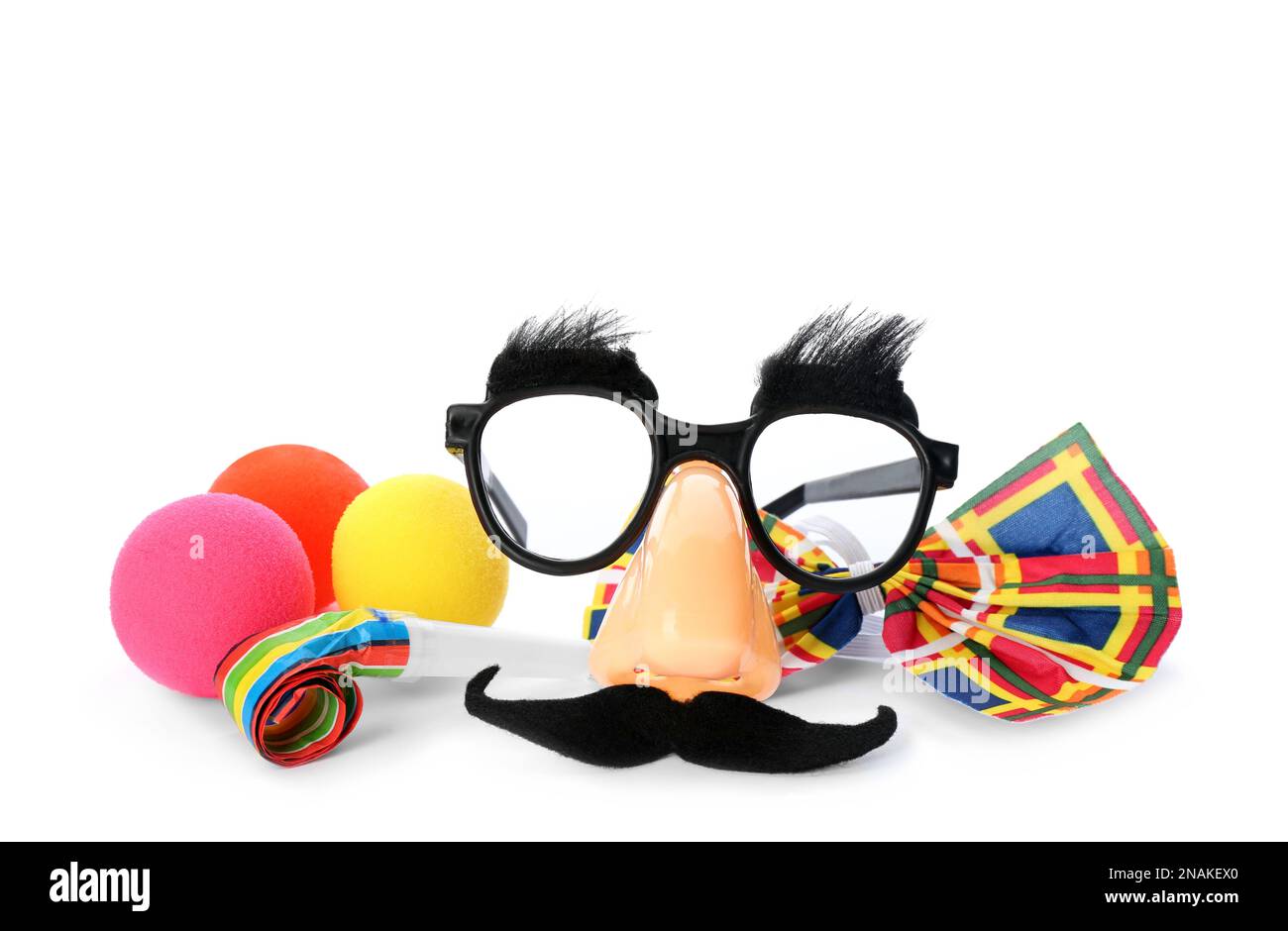 Different funny clown's accessories on white background Stock Photo - Alamy