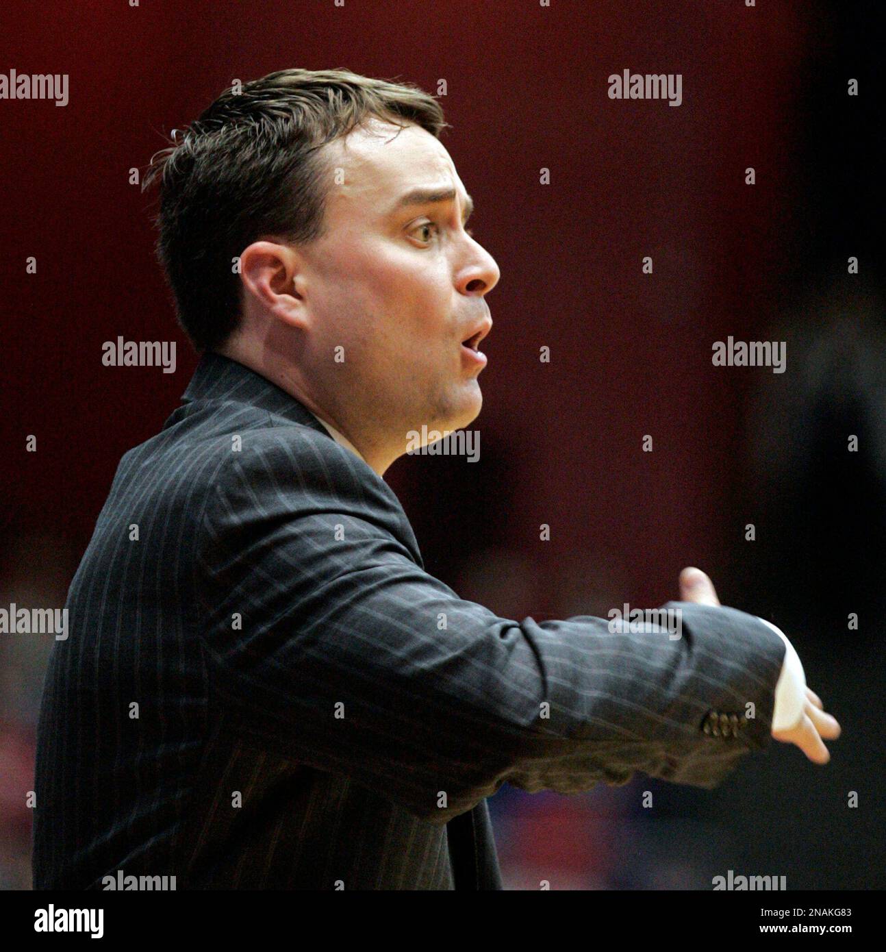 Dayton head coach Archie Miller shouts to his team during the first ...