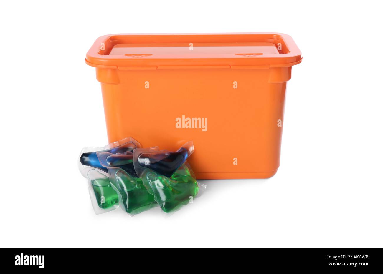 Laundry capsules and box on white background Stock Photo - Alamy