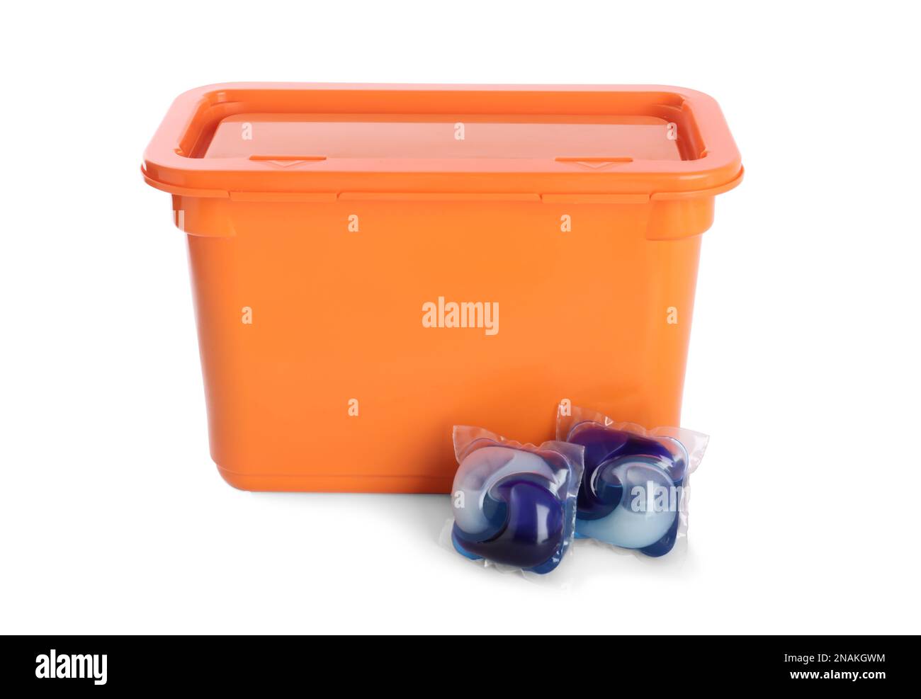 Laundry capsules and box on white background Stock Photo - Alamy