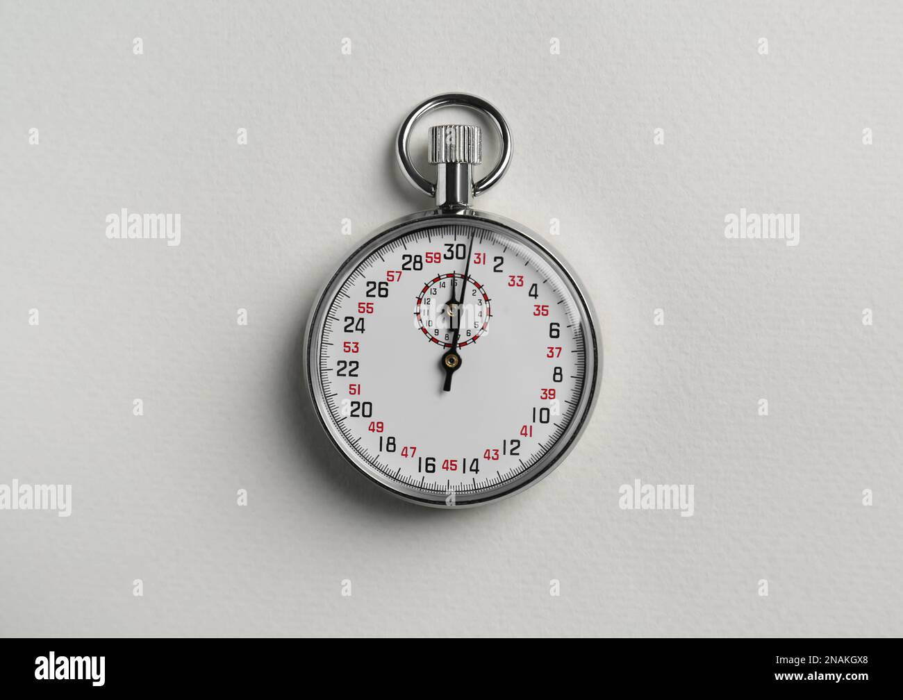 Vintage timer on light grey background, top view Stock Photo - Alamy