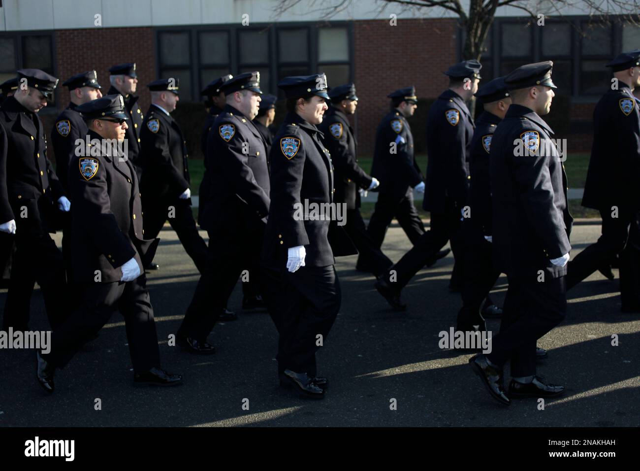 Police officers line up for Officer Peter Figoski's funeral in Babylon ...