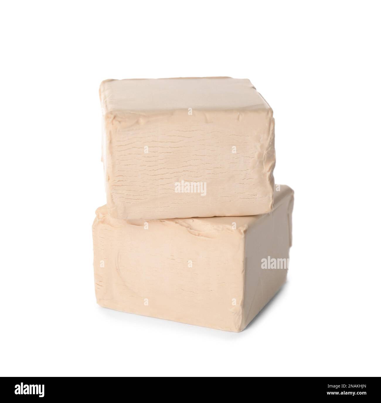 Blocks of compressed yeast on white background Stock Photo - Alamy