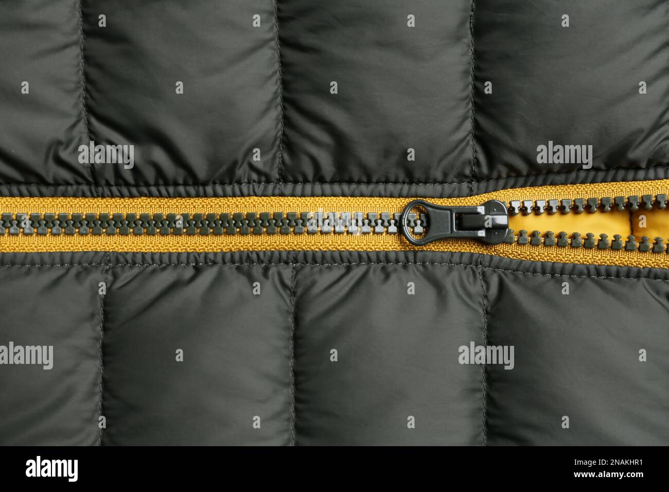 Jacket with zipper as background, top view Stock Photo - Alamy