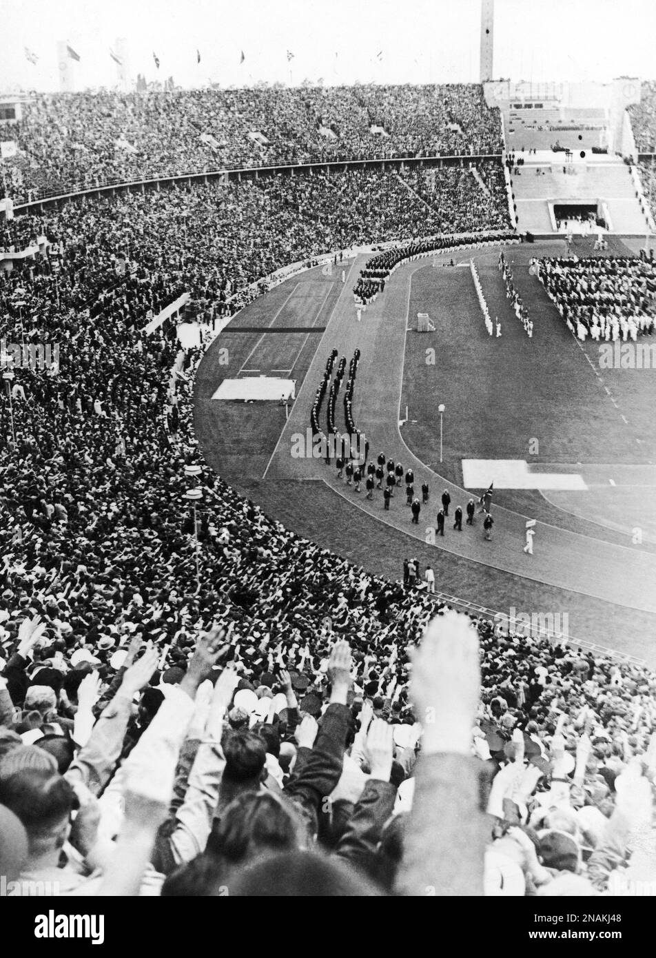 The audience greets the Australian team with the Nazi salute as it ...