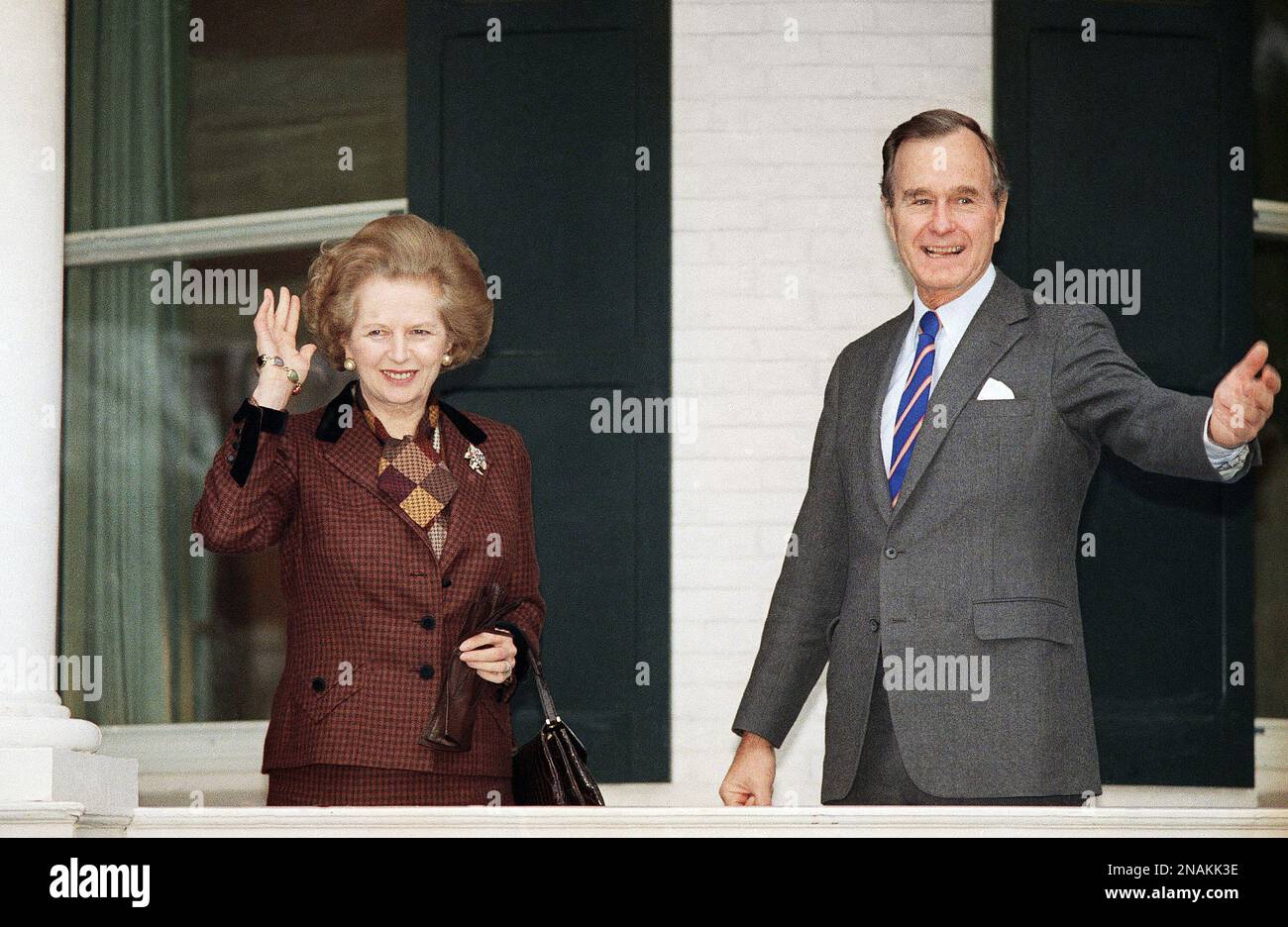 Prime Minister Margaret Thatcher and Vice President George Bush stand ...