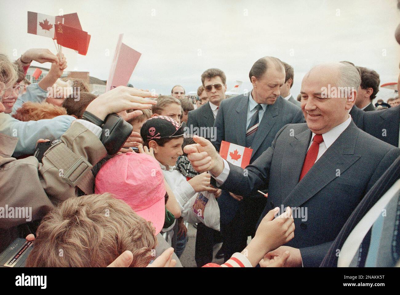 Soviet President Mikhail Gorbachev is greeted by children during an ...