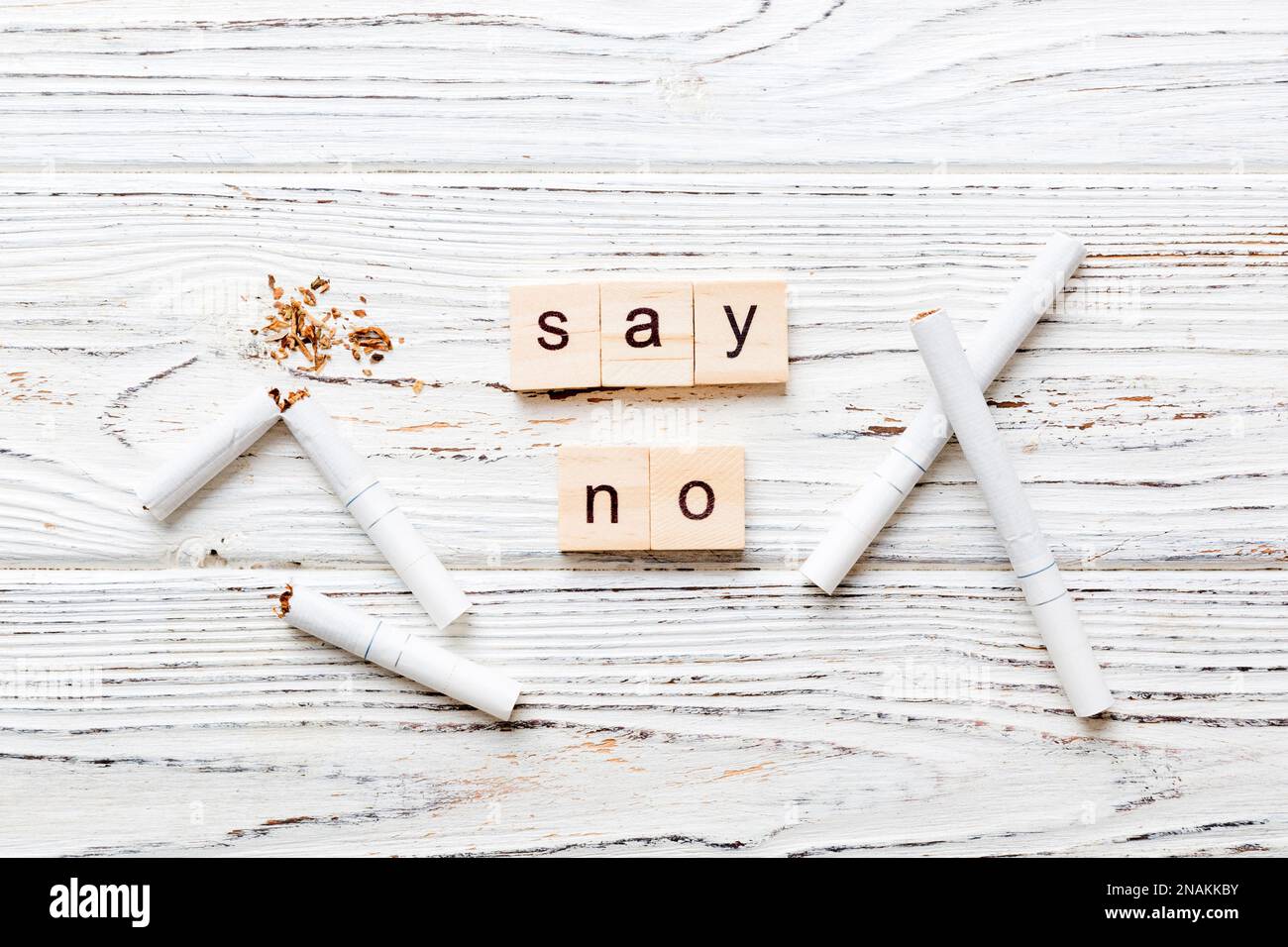 Cigarette And Wooden Blocks, Broken cigarette on table background, No ...