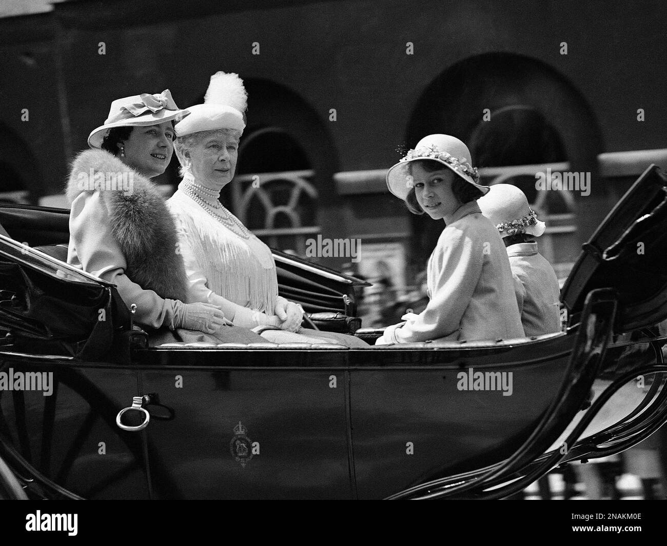 Britain's Queen Elizabeth, right, with Queen Mary, second right, and ...