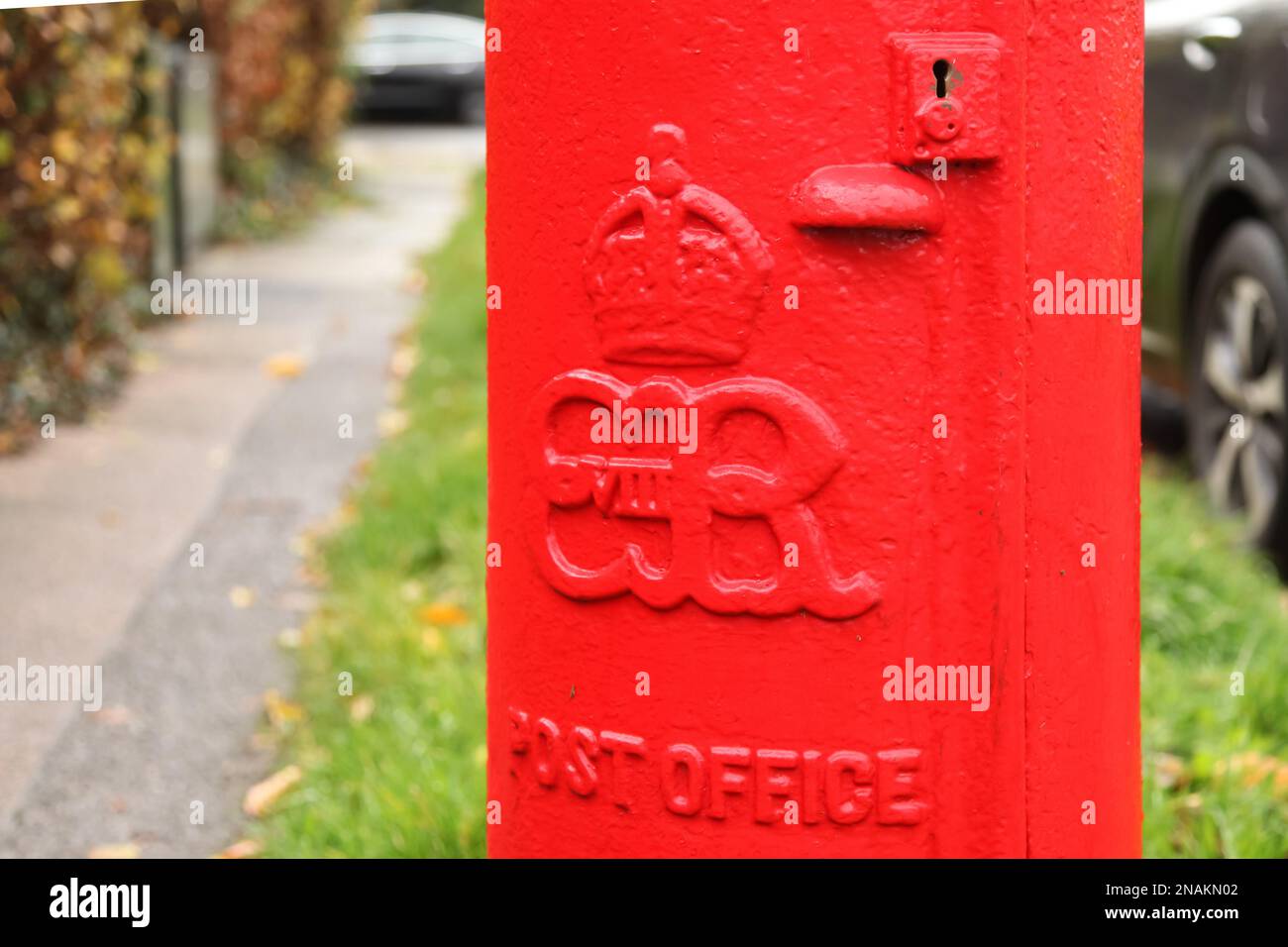 British Red Post Box with ERII cypher post office mailbox Stock Photo ...