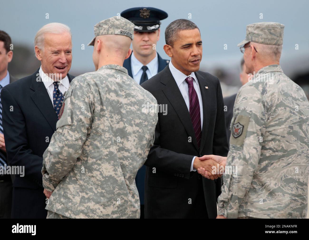 President Barack Obama and Vice President Joe Biden greet troops on the ...
