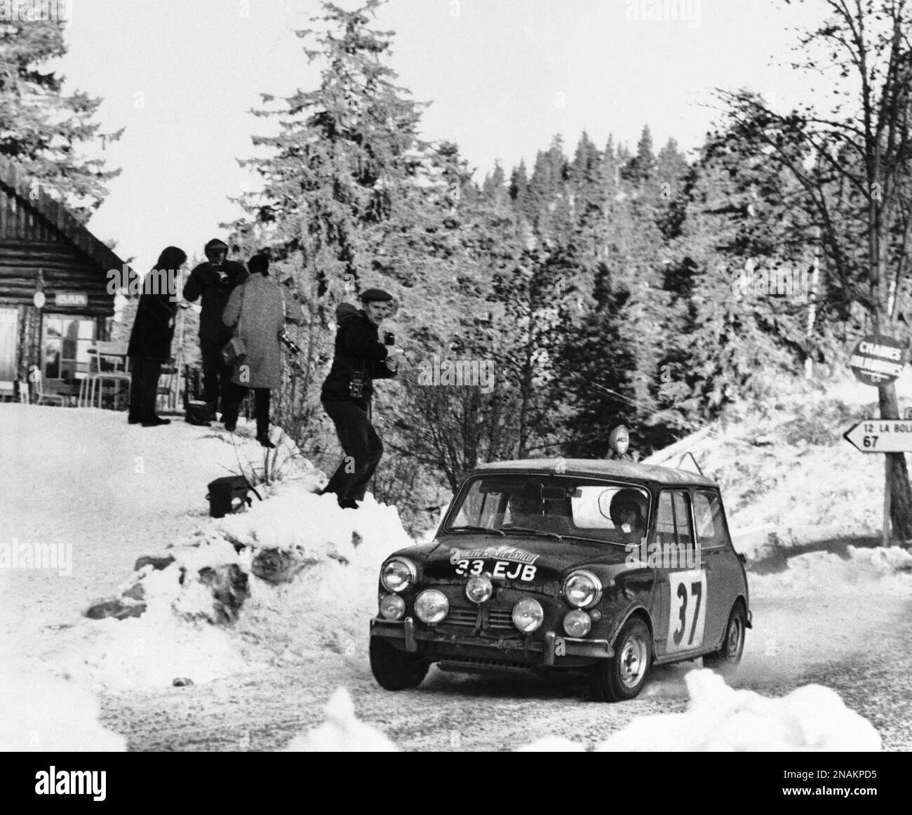 The British Rally team of Paddy Hopkirk and Henry Liddon pass the ...