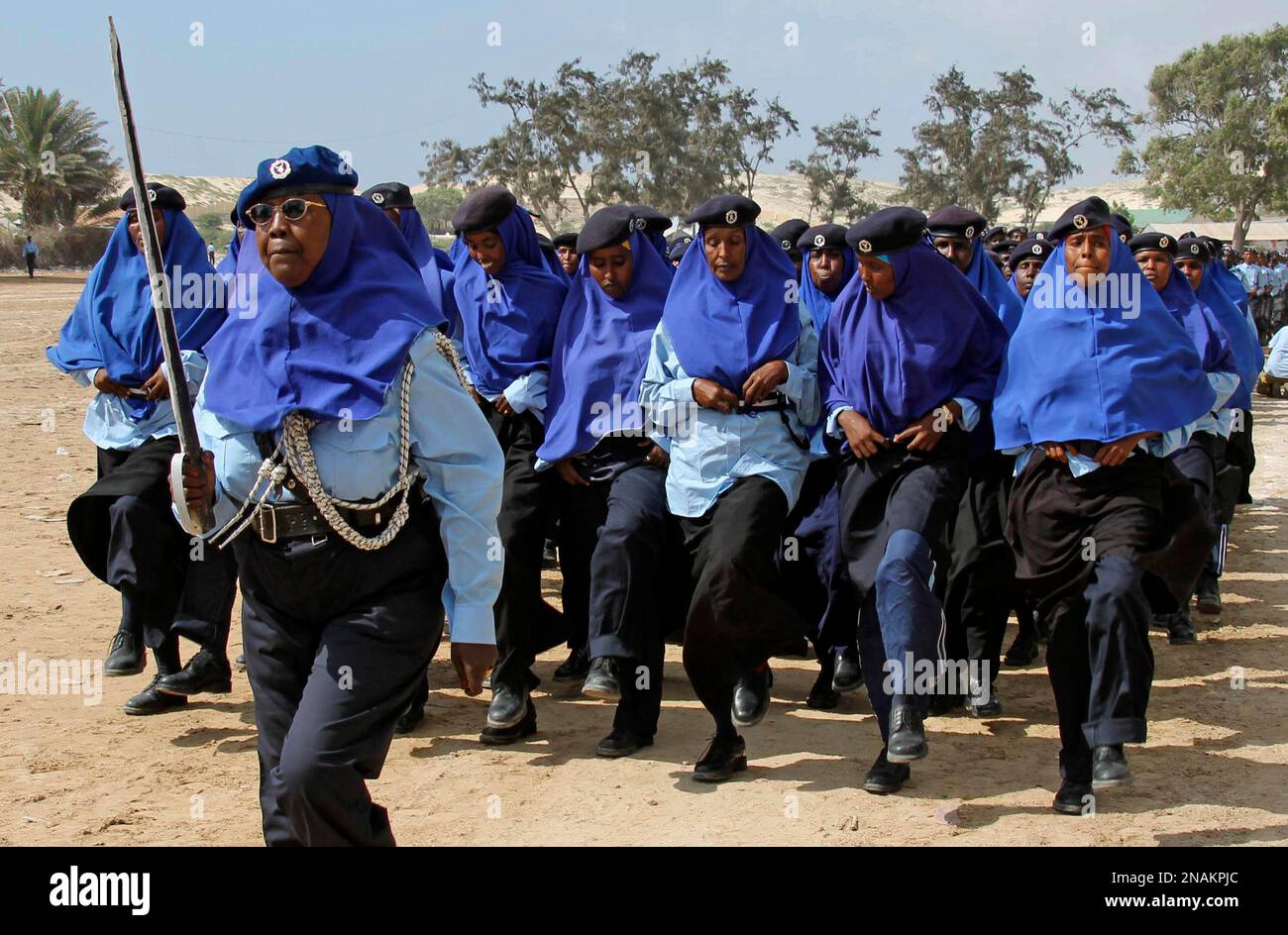 Somali female police officers march at the police academy compound as ...