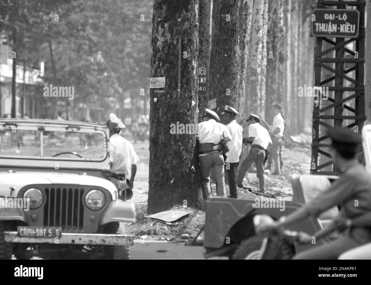 Police search for Viet Cong during the Vietnam War in Saigon in an ...