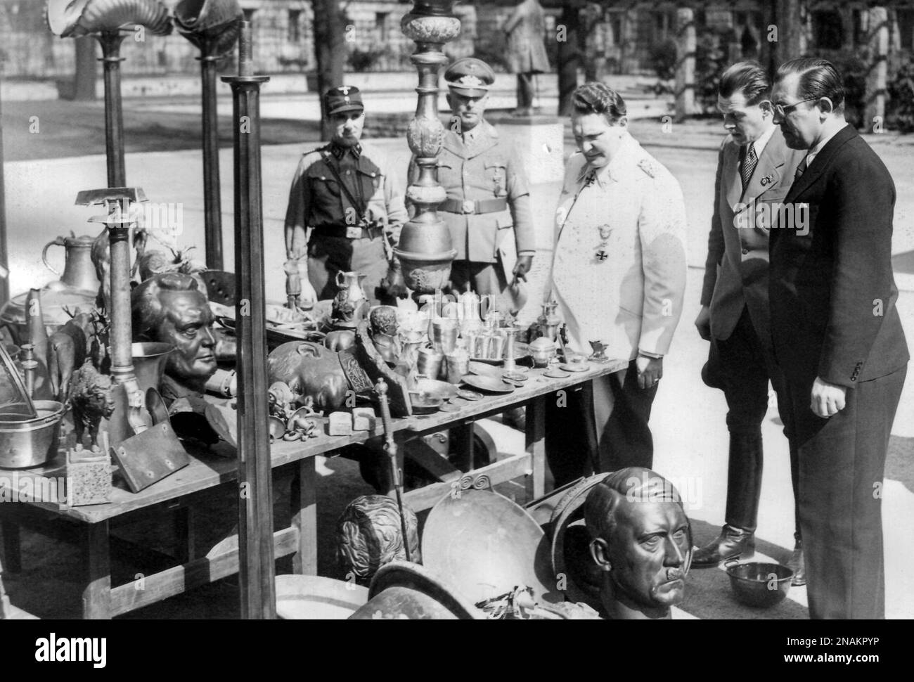 Field Marshal Hermann Goring is shown in one of his many white-jacketed ...