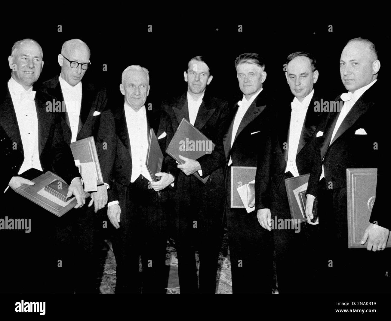The seven Nobel Prize winners with their diplomas after the ceremony in ...