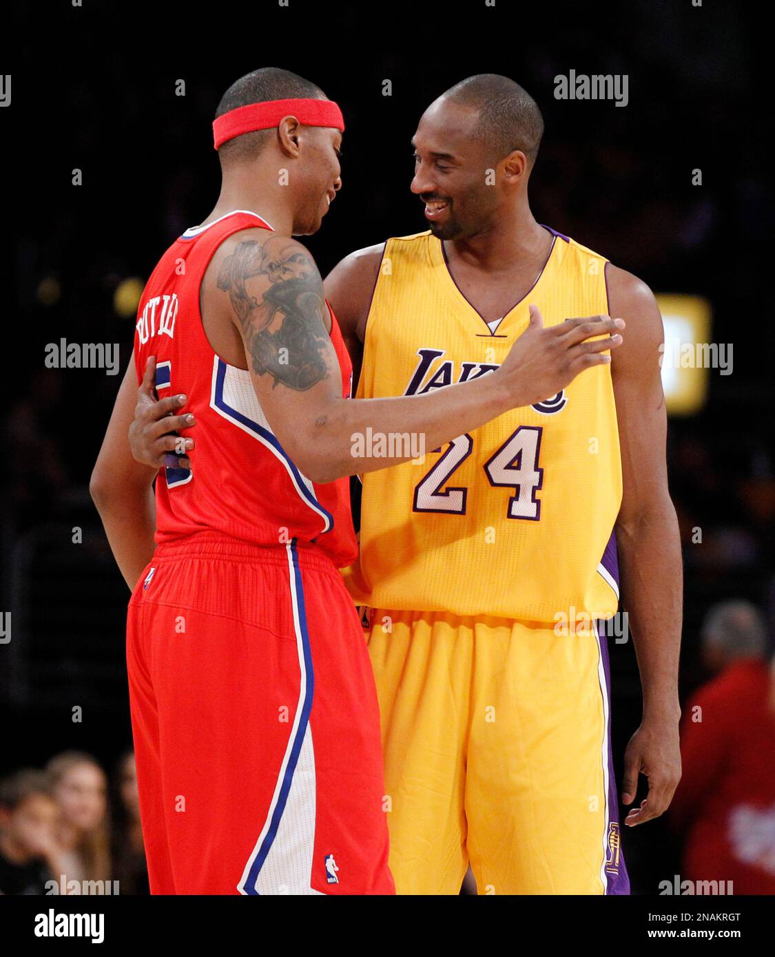 Los Angeles Lakers' Kobe Bryant hugs Los Angeles Clippers' Caron Butler ...