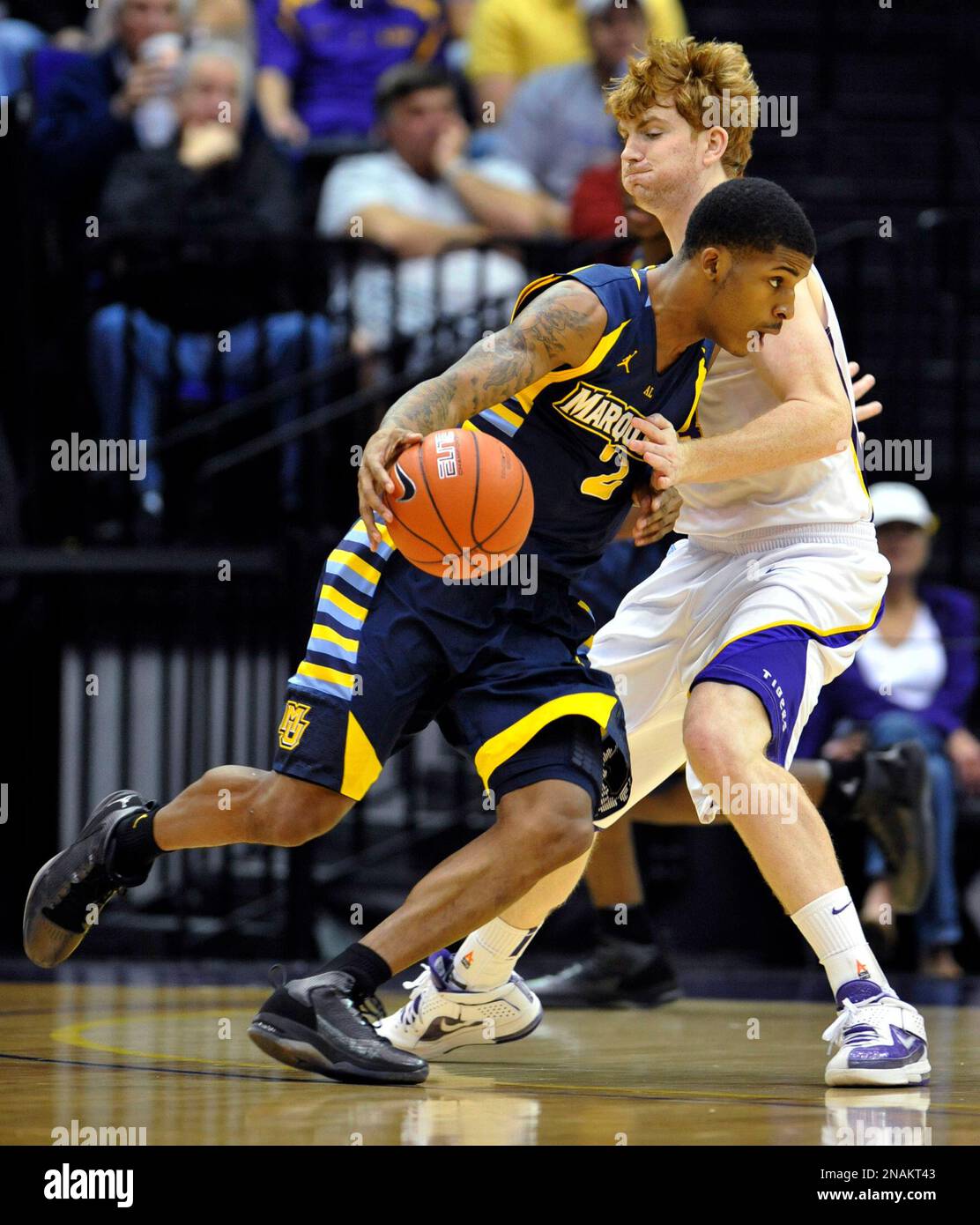 Marquette guard Vander Blue (2) attempts to work the ball around LSU ...