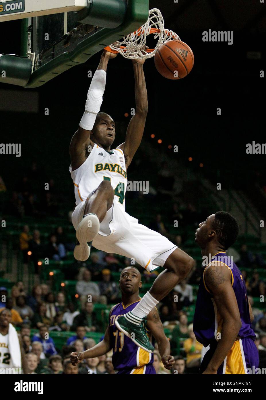 Baylor guard Deuce Bello (14) dunks as Paul Quinn guards Quentin ...