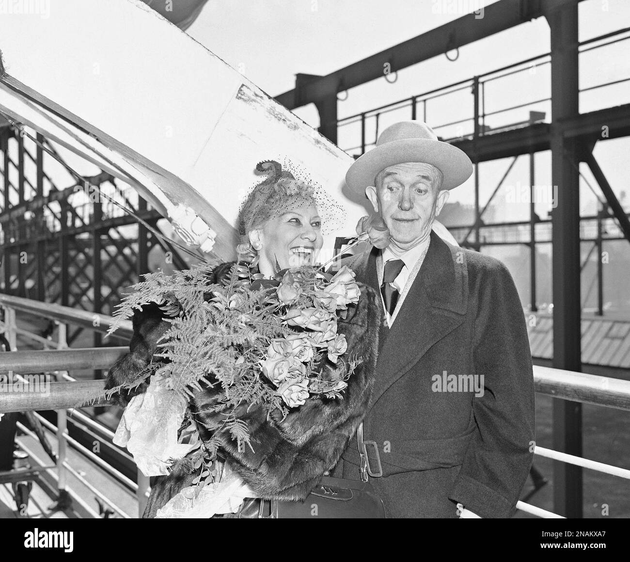 Movie comedian Stan Laurel and his wife, Ida, pose aboard the Cunard ...