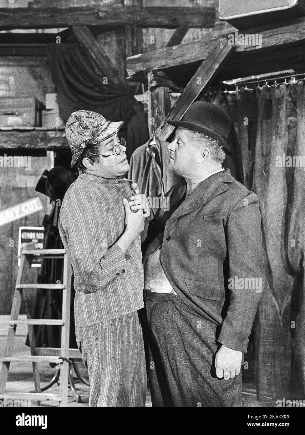 German actors Walter Giller as the "Beggar" and Gert Froebe in his role ...