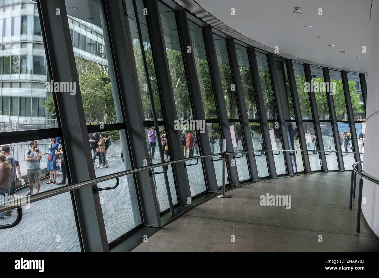 Inside London City Hall, looking out the slanted glass wall. Former ...