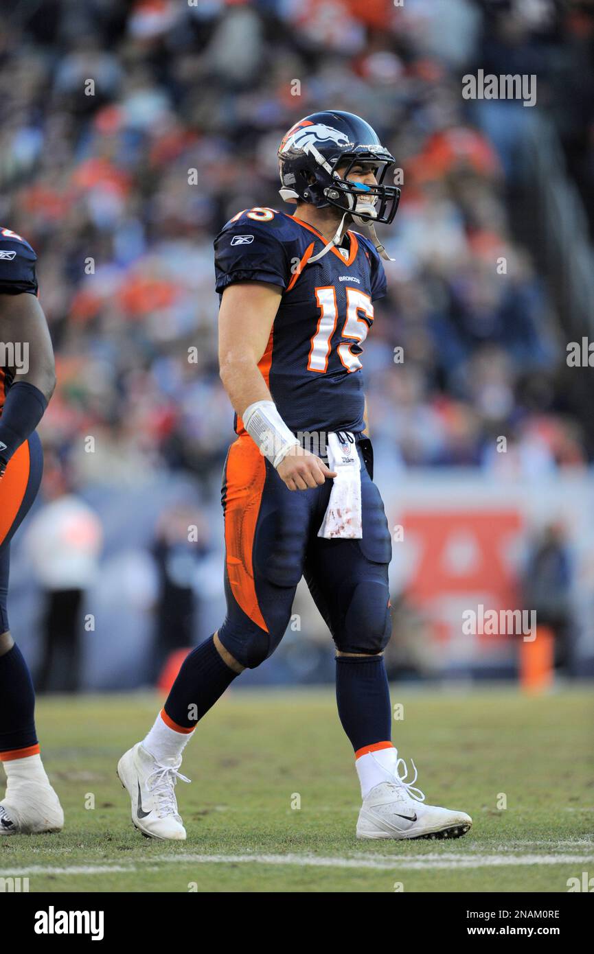 Denver Broncos quarterback Tim Tebow (15) reacts to fumbling the ball ...