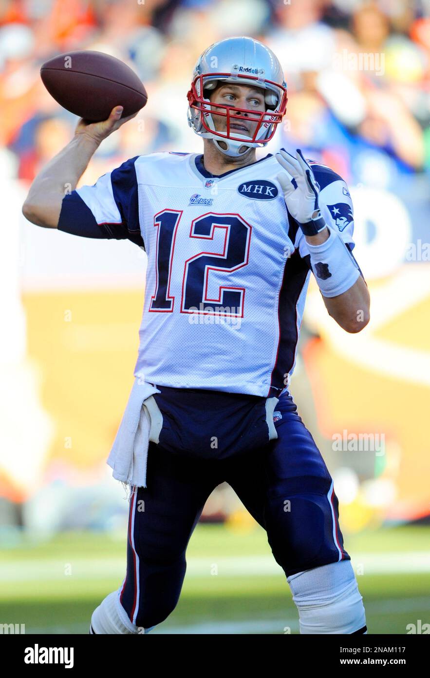 New England Patriots quarterback Tom Brady (12) throws against the ...