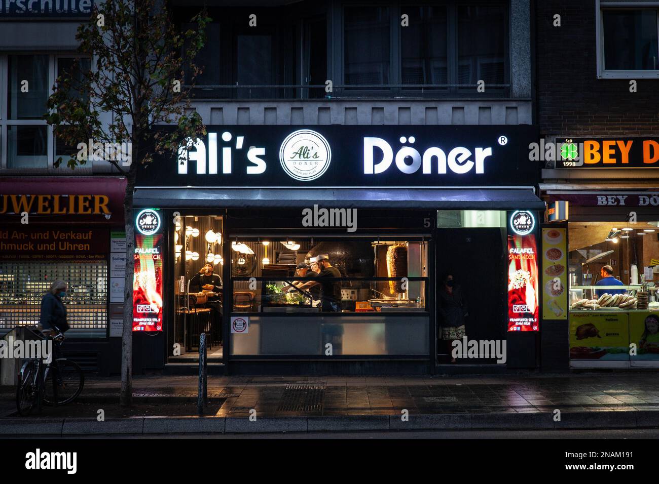 Picture of a street of Cologne, Germany at night, with a Kebab Fast ...