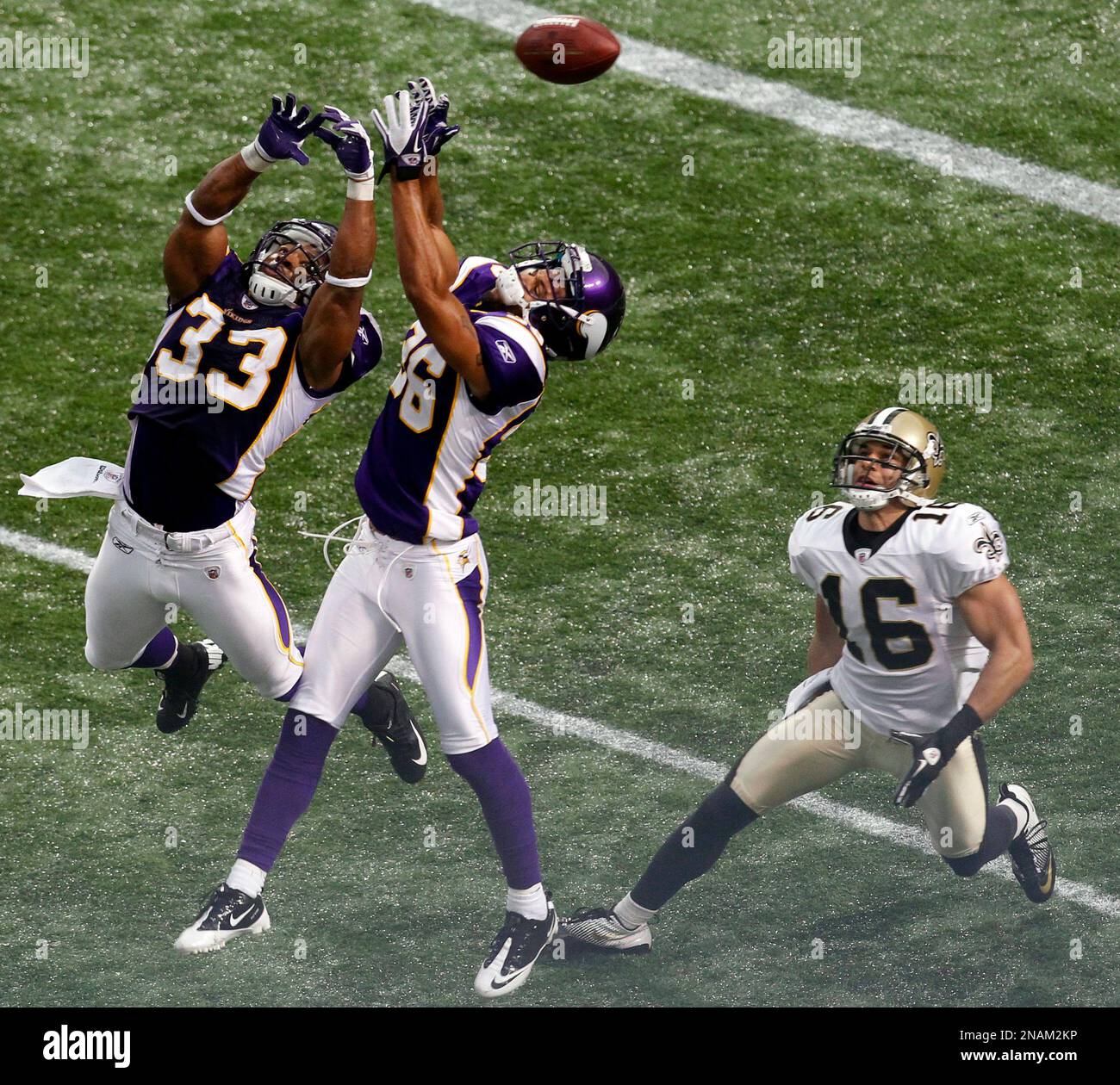 Minnesota Vikings' Jamarca Sanford (33) and Brandon Burton (36) break ...