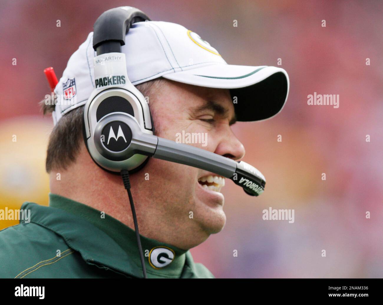 Green Bay Packers coach Mike McCarthy talks with coaches in the booth ...
