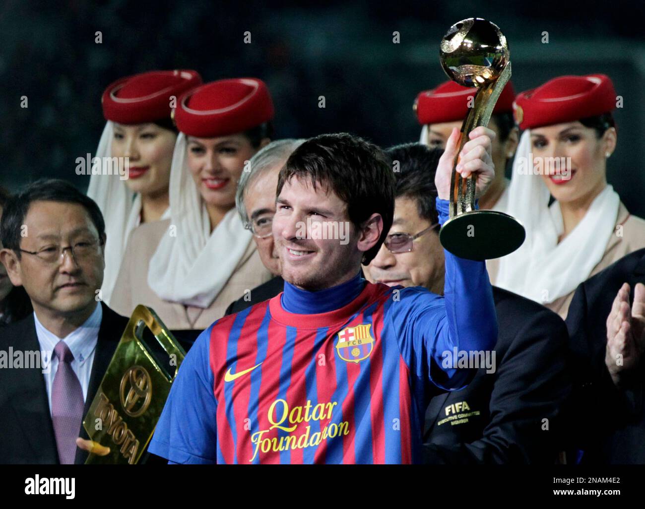 Spain's FC Barcelona midfielder Lionel Messi holds the Golden Ball ...