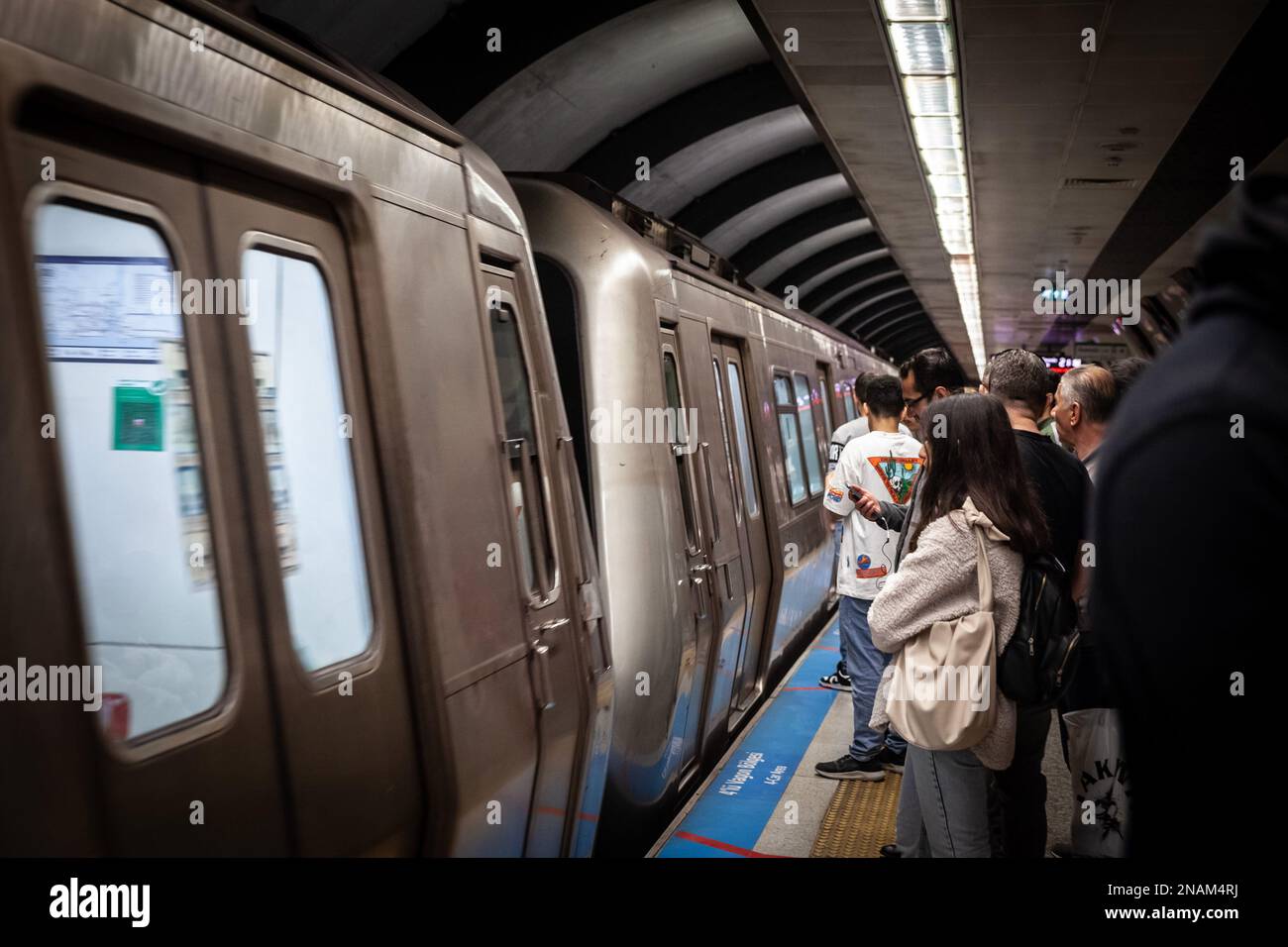 Picture of a metro of Istanbul Metro, on Line 2, with people waiting in ...