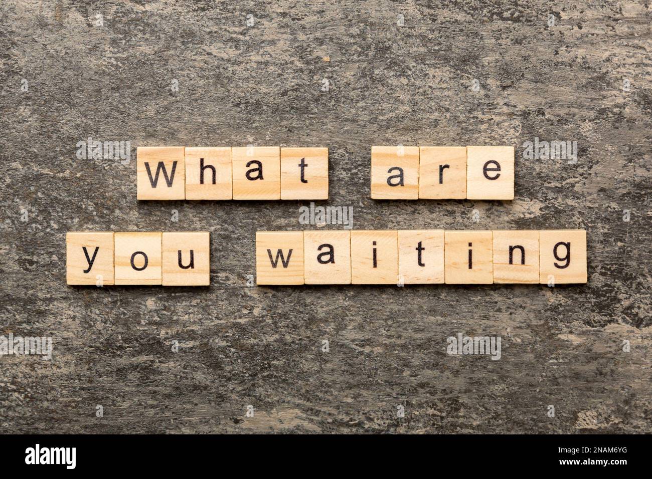 What are you waiting word written on wood block. What are you waiting ...