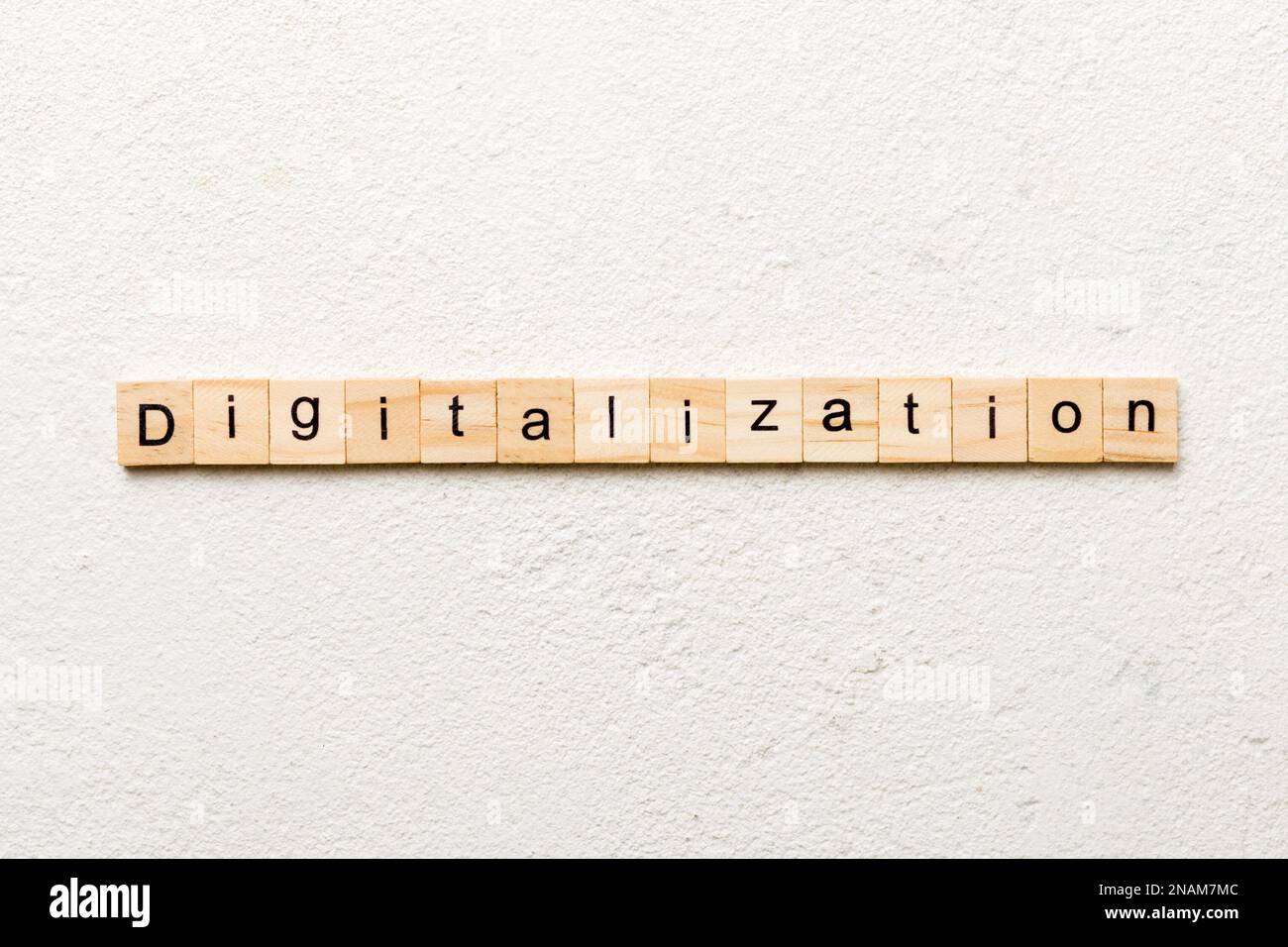 digitalization word written on wood block. digitalization text on ...