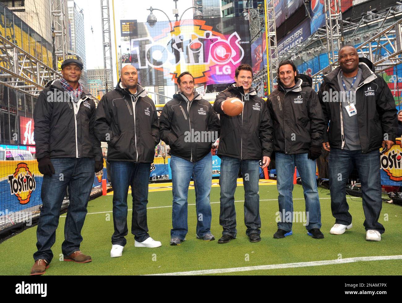 Nick Lachey, third right, along with football greats Eddie George ...