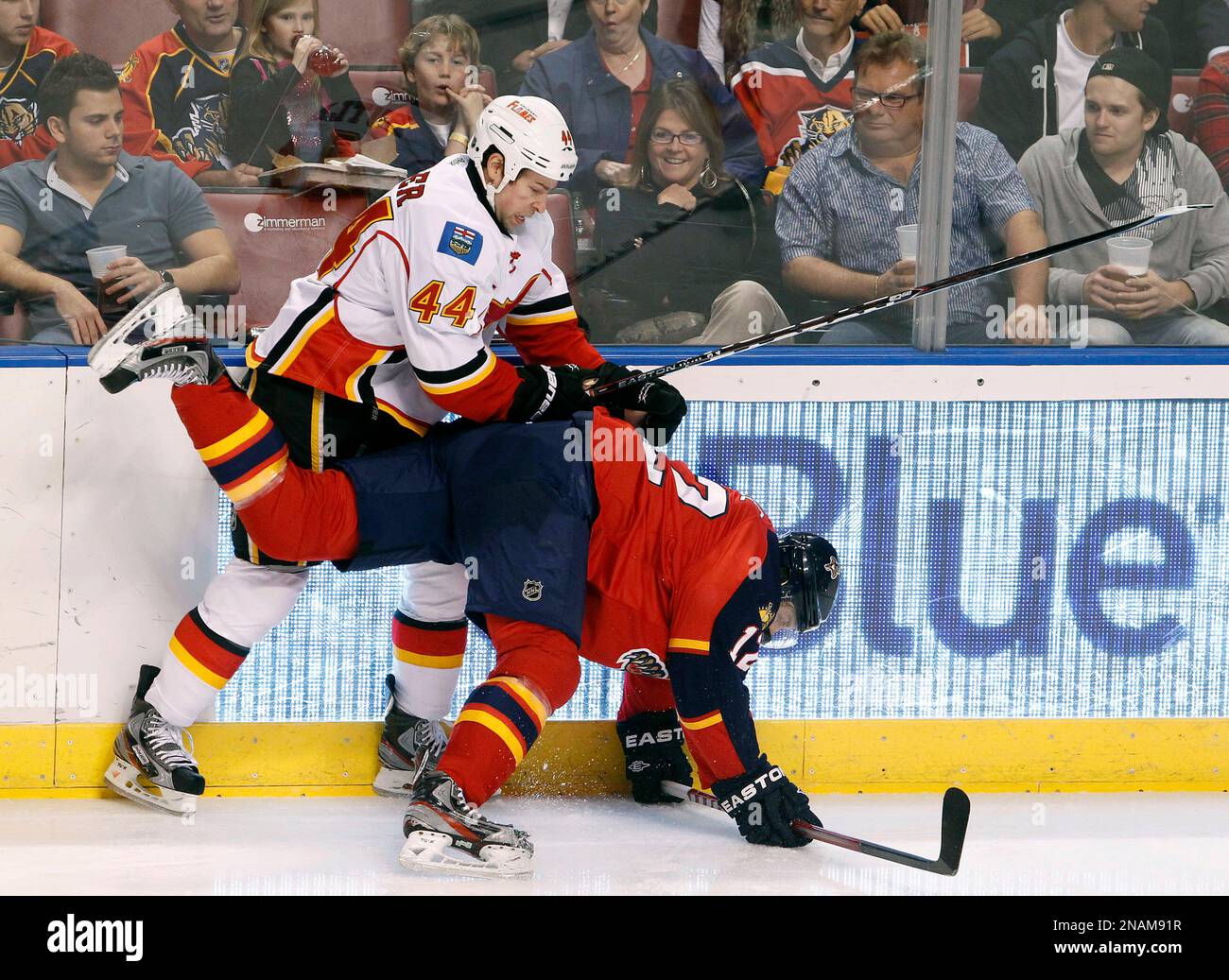 Calgary Flames defenseman Chris Butler (44) and Florida Panthers right ...