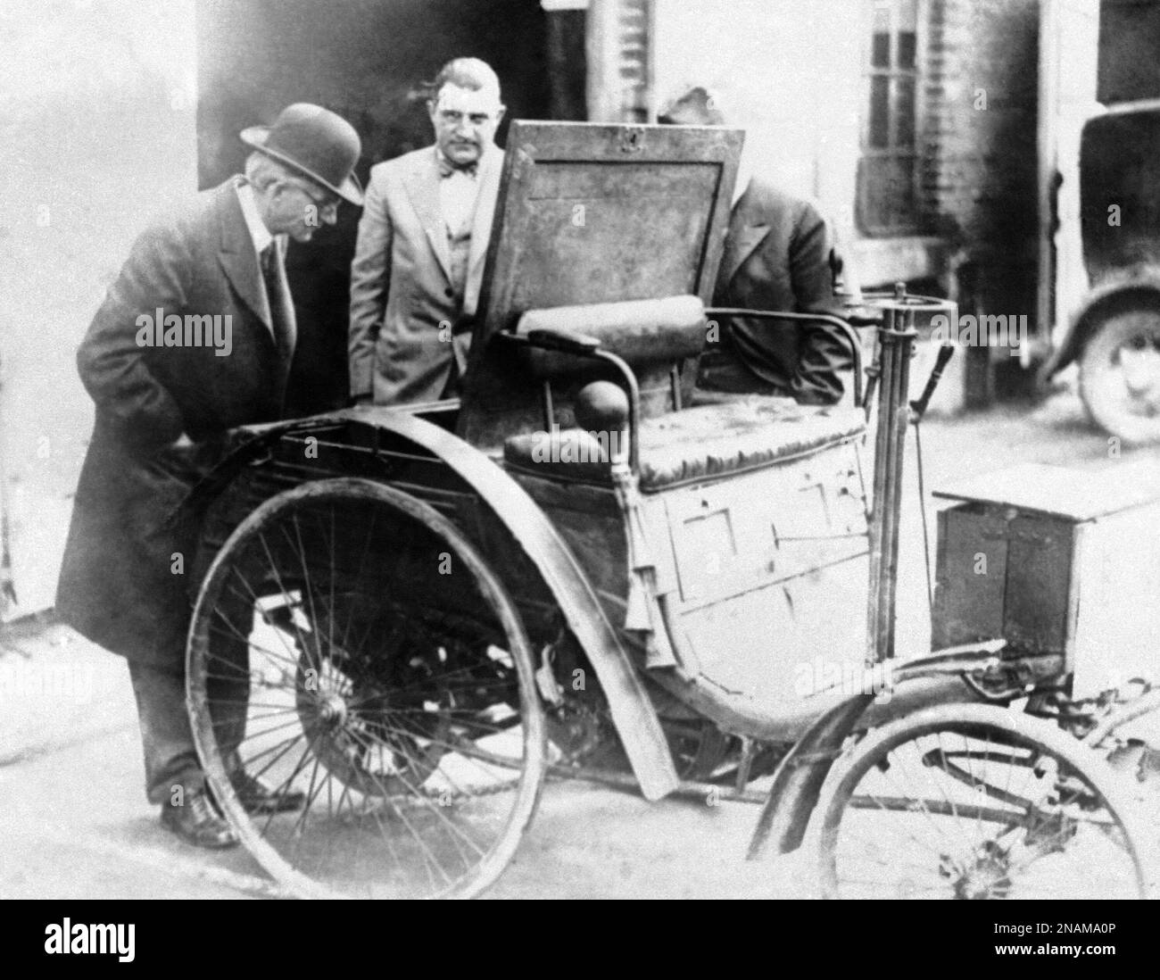 Henry Ford looks at the first Benz car he brought in Munich, Germany ...