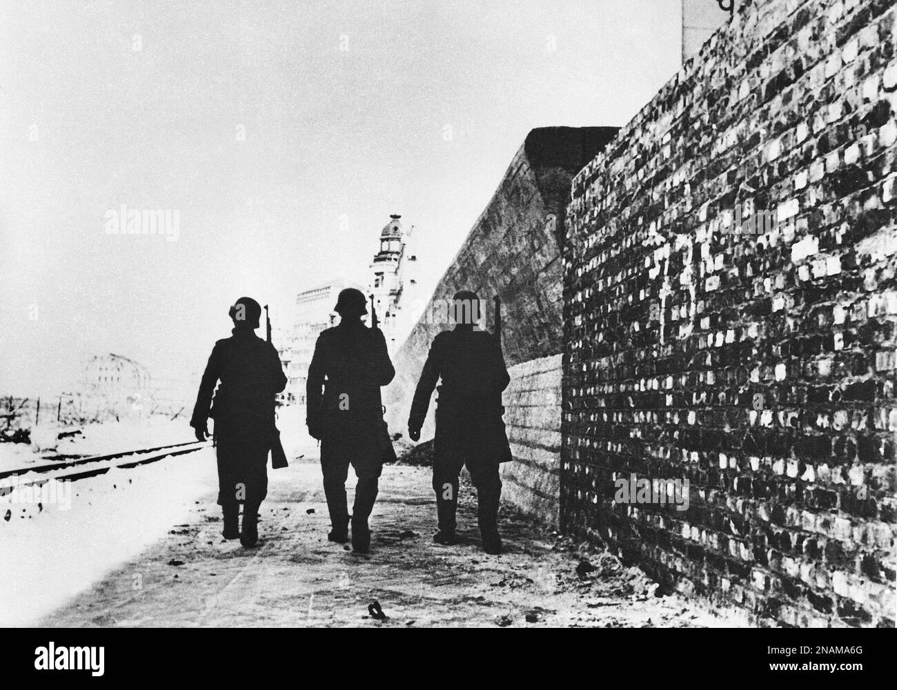A German patrol guarding a defense wall on the French Channel coast ...