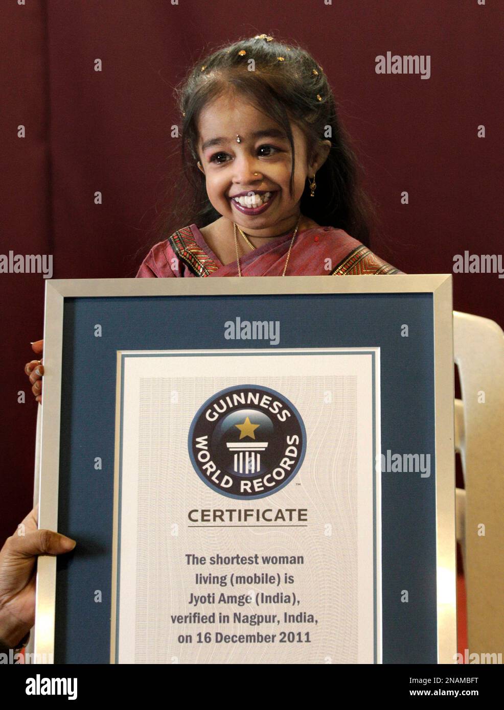 Jyoti Amge, 18, smiles after getting the title of the Shortest Woman of ...